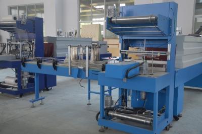 China Plastic Packaging Material Bottle Heat Shrink Wrapping Machine with Heat Shrink Oven for sale