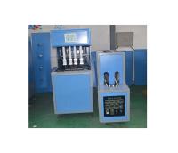 China Semi Automatic 4 Cavity PET Bottle Blowing Machine for Plastic Bottle Manufacturing for sale