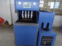 China Semi Automatic 4 Cavity PET Bottle Blowing Machine for Plastic Bottle Manufacturing for sale
