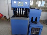 China Semi Automatic 4 Cavity PET Bottle Blowing Machine for Plastic Bottle Manufacturing for sale