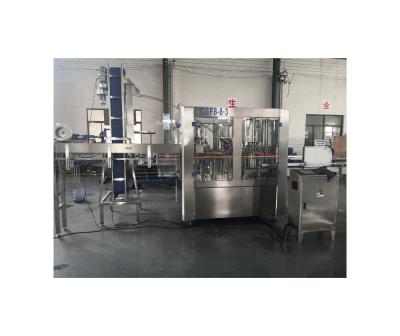 China 8 BOTTLE WASHING HEADS 3000BPH LIQUOR BEER FILLING MACHINE FOR BEER MANUFACTURING LINE for sale
