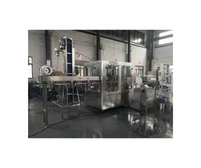 China 8 BOTTLE WASHING HEADS 3000BPH LIQUOR BEER FILLING MACHINE FOR BEER MANUFACTURING LINE for sale