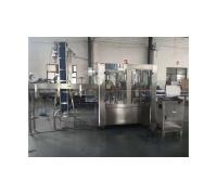 China Plastic Packaging Material Three-in-One Beer Bottle Filling Machine with 3000BPH for sale