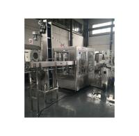 China Plastic Packaging Material Three-in-One Beer Bottle Filling Machine with 3000BPH for sale