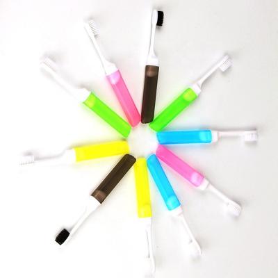 China Adults Custom Toothbrush Soft Colorful Plastic Handle Soft Stiffens Travel Folding Toothbrush factory