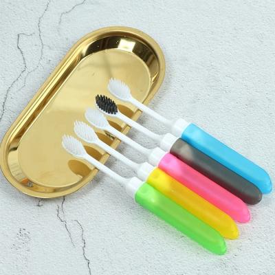 China Sustainable Soft Adult Toothbrush Toothbrush Soft Stiffens Foldable Plastic Travel Toothbrush factory