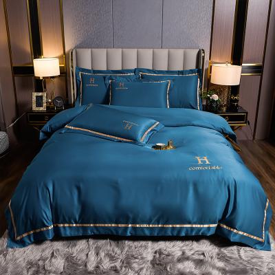 Cina Logo personalizzato Inverno ricamato poliestere lavato biancheria da letto seta seta seta seta per colore solido in vendita