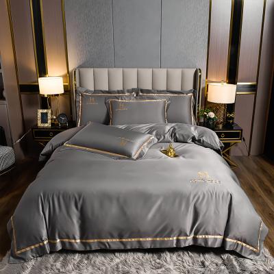 Cina Logo personalizzato Inverno ricamato poliestere lavato biancheria da letto seta seta seta seta per colore solido in vendita