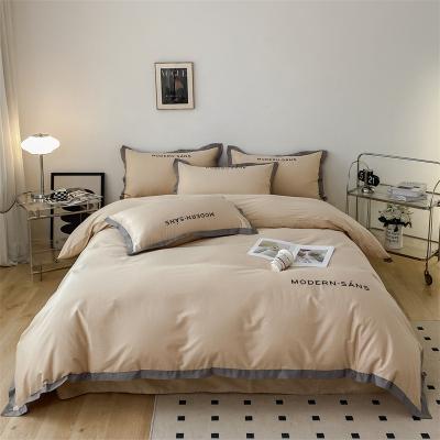 Cina 2023 Stile Grado A 100% cotone 4pcs Set di biancheria da letto con processo di abbinamento ad angolo ricamato in vendita