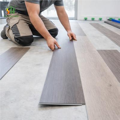 China SPC Rigid Core Vinyl Plank Flooring with Class 33/42 Rating, 0.3-0.7mm Wear Layer, and Bfl-s1 Fire Classification for sale