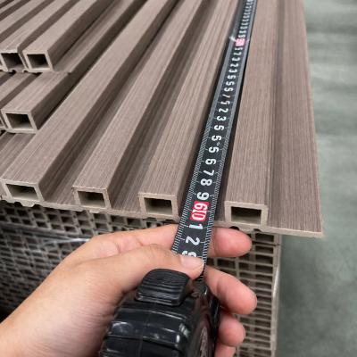 China WPC Seven Hole Hollow Fluted Wall Panel Waterproof Grille Wall Cladding Board for Interior and Exterior Wall Decoration for sale