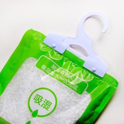 China Moisture Absorber k Packaging Bag , 16*29cm Home Hanging Dehumidifier Bag for sale