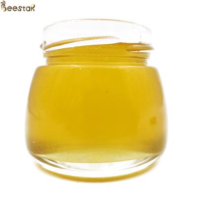 China Pure rauwe honing Natuur Fruitwood Flower Honing Geen verslavende stof Heldergele kleur 100% Natuurlijke Bijenhoning for sale