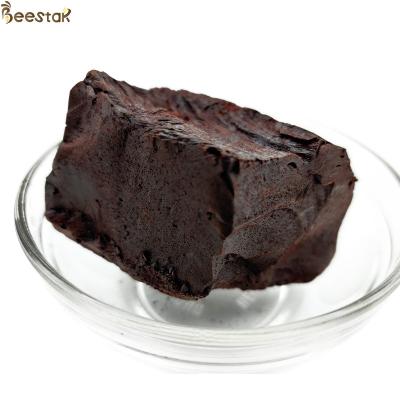 China Propóleo natural de abeja 90% Extracto de propóleo de abeja bloque Extracto a granel en venta