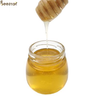 China Wholesale Wubei Flower Honey 100% Natural Bee Honey with Light Amber Color 18.7% Moisture and 73.4% Reduce Sugar for sale