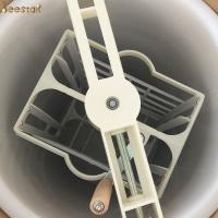 China 2 frame plastic manual honey processing extraction machine beekeeping honey extractor for sale