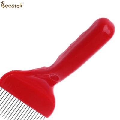 Κίνα Κόκκινο παχύ μέλι λαβών που εκπωματίζει τη μελισσοκομία εργαλείων κυψελών εργαλείων που εκπωματίζει το δίκρανο προς πώληση