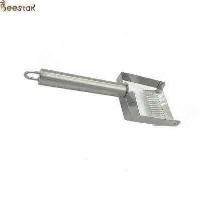 中国 フォークの蜂のワックスの蜜蜂装置のApiculture Ssのハンドルのふたを取る17本の針 販売のため