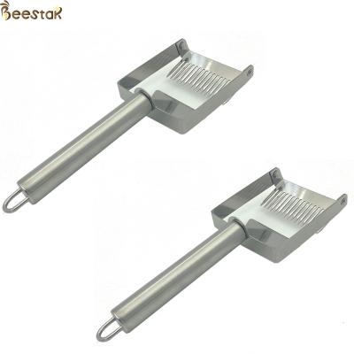 中国 フォークの蜂のワックスの蜜蜂装置のApiculture Ssのハンドルのふたを取る17本の針 販売のため