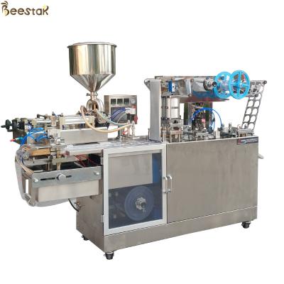 China Automatic Honey Liquid Filling Machine Without Mixer Ice Cream Cup Filling Machine for sale