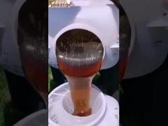 A Closer Look: High-quality honey like a golden waterfall