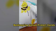 White Sheepskin Beekeeping Gloves and bee hive tool