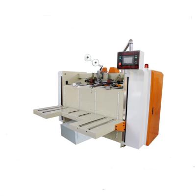 China Máquina de costura de la caja del cartón de la frecuencia 50/60Hz para las soluciones del empaquetado industrial en venta