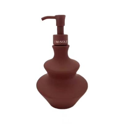 China Irregular Shaped Plastic Pump Bottle Spiral Lock Empty Shampoo Bottles (MC-419) for sale