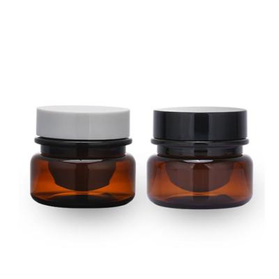 Cina Barattolo cosmetico all'ingrosso della crema di imballaggio per alimenti 30ml Amber Black Pet Plastic Cosmetic con il coperchio nero bianco in vendita