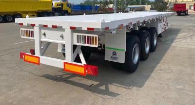 China Jost Kingpin 50T Load Capacity Semi Flat Bed Trailer AND9400 For Heavy Duty Transportation for sale
