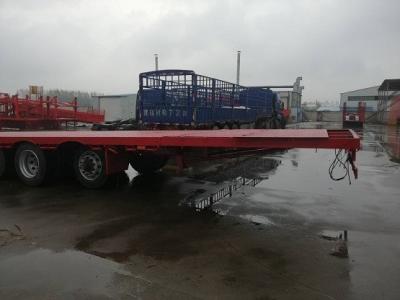 China Semi Trailer 3 Axles Container Transport Carrier Flatbed Semi Truck Trailer for sale