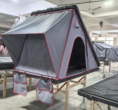 China Manufacturer Sales 4 Person Car Rooftop Tent New Style Hard Aluminum Triangle Clamshell with Oxford Fabric Roof Top Tent for sale