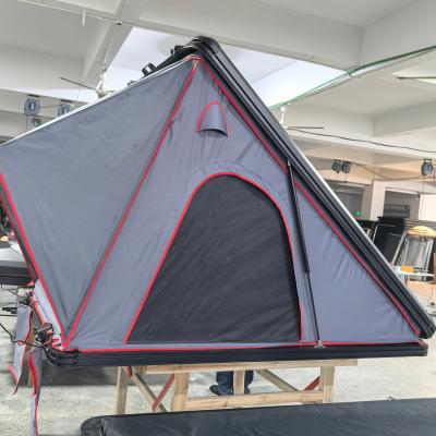 China 2025 Outdoor Camping Triangle Hard Clamshell 4 Person Waterproof Car Rooftop Tent Aluminum Hard Shell Roof Top Tent for Sale for sale