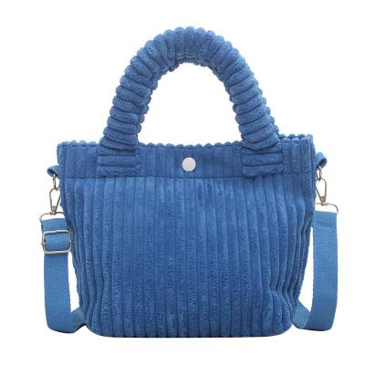 Cina Borse della borsa delle donne del velluto a coste di prezzo franco fabbrica le nuove sistemano i sacchi per cadaveri inter- del secchio del bottone di nylon femminile versatile delle borse a tracolle in vendita