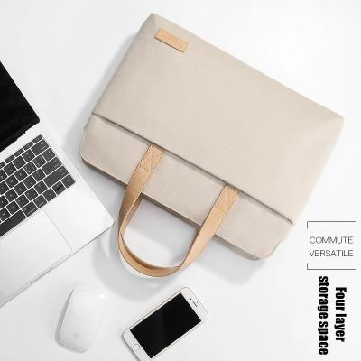 中国 Ipad華為技術のmatebook 14inchコンピュータ袋のラップトップの袖のハンドバッグのための2021年の工場価格のラップトップ袋はとのロゴをカスタマイズする 販売のため