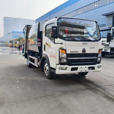 China HOWO Waste Removal Compressor Compression Compressed Basement Garbage Truck for sale