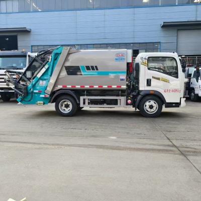 China HOWO Waste Removal Compressor Compression Compressed Basement Garbage Truck for sale