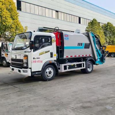 China HOWO Waste Removal Compressor Compression Compressed Basement Garbage Truck for sale