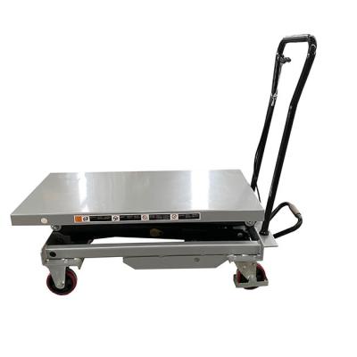 China Hot Sales Mobile 800Kg Payload Capacity Platform 1010mm * 520mm Manual Scissor Lifter Tables Max Height 1410mm for sale