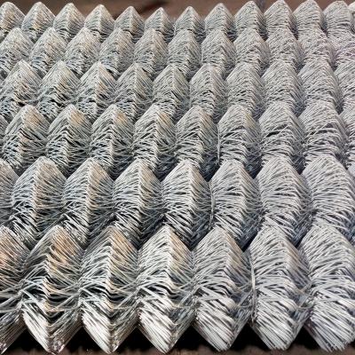 China Chain Link Fence Featuring Durable Metal Mesh with Evenly Distributed Holes Ensuring Excellent Compression and Tensile Performance for sale