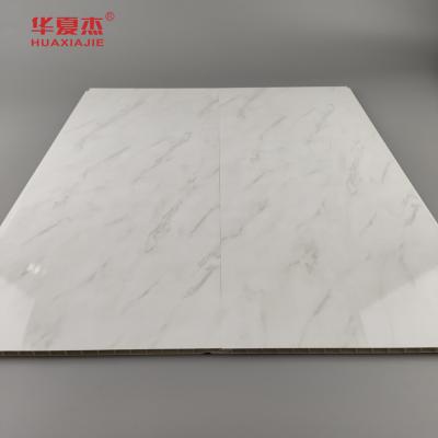 China Painel de parede de pvc de mármore impermeável painel de tecto de pvc decorativo material de construção de impressão à venda