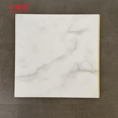 Cina Pannello da parete Wpc di marmo bianco di alta qualità 600x9mm Tavola Wpc stratificata impermeabile facile da pulire in vendita