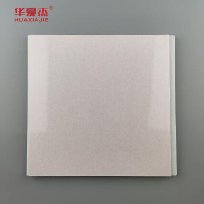 China Nieuw ontwerp geometrisch patroon pvc wandpaneel parelscherp gelamineerd plafondpaneel pvc voor wanddecoratie Te koop
