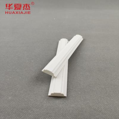 China 22x6mm White Vinyl PVC Foam Trim Moulding for Interior Wall Base Cap with Woodgrain Finish for sale