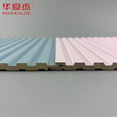 China Durable Wpc Intdoor Wall Panel Laminated Pink and BlueFor Office Hotel Decoration for sale