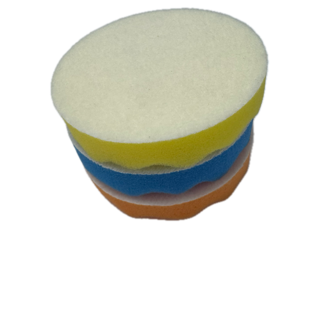 Close-up view of car buffing pad with detailed surface pattern