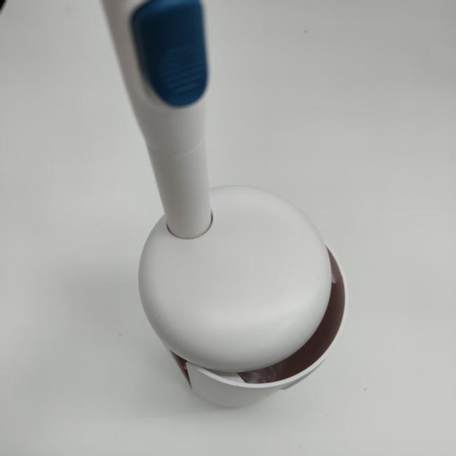 Close-up of disposable toilet brush head