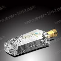 China Transparent Embossing Premium Bespoke Tequila Rectangular Bottle for sale