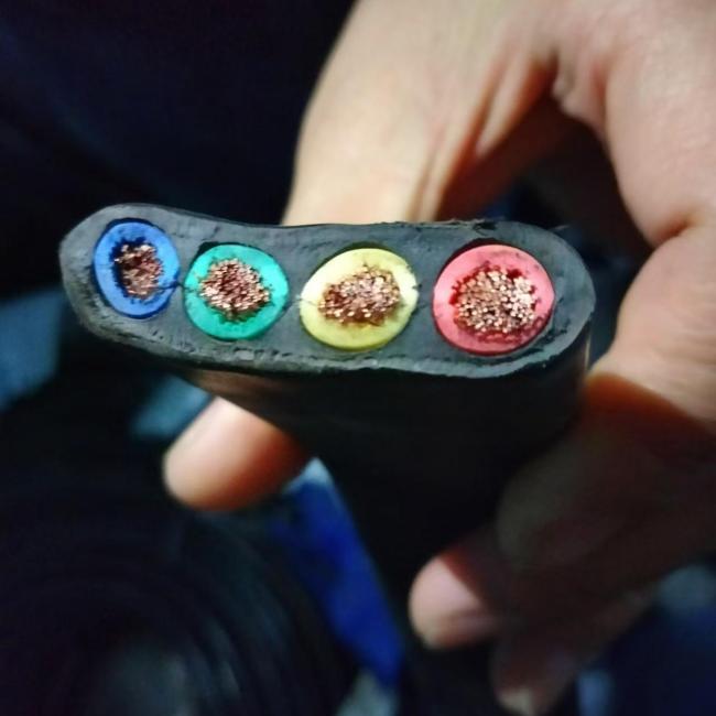 Flat rubber cable in use