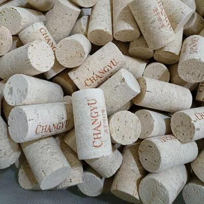 Cina Tappo per bottiglie di vodka tequila con logo personalizzato in forma di T, sughero sintetico e tappo in legno in vendita